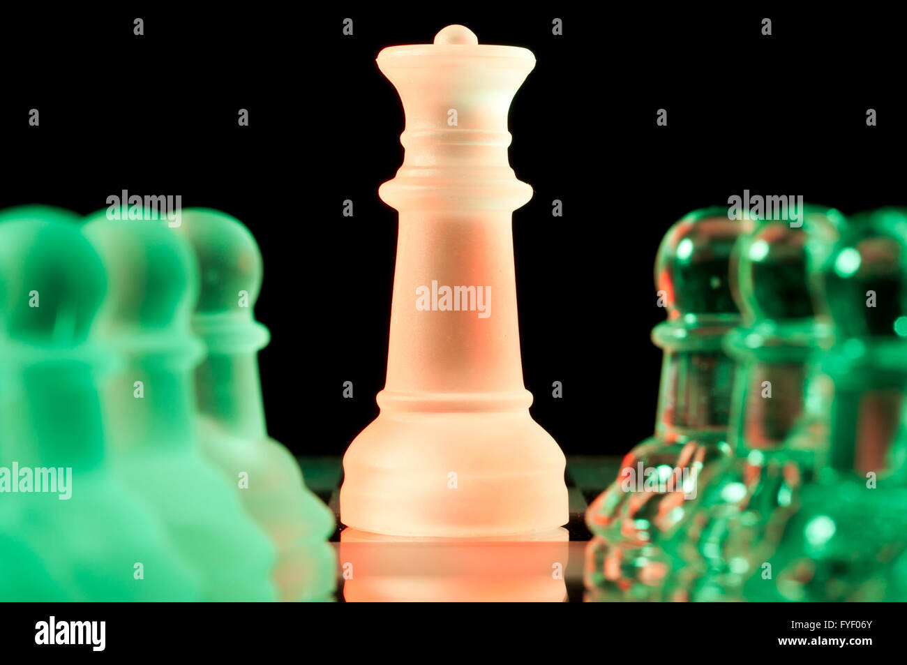 red and green glass chess pieces Stock Photo - Alamy