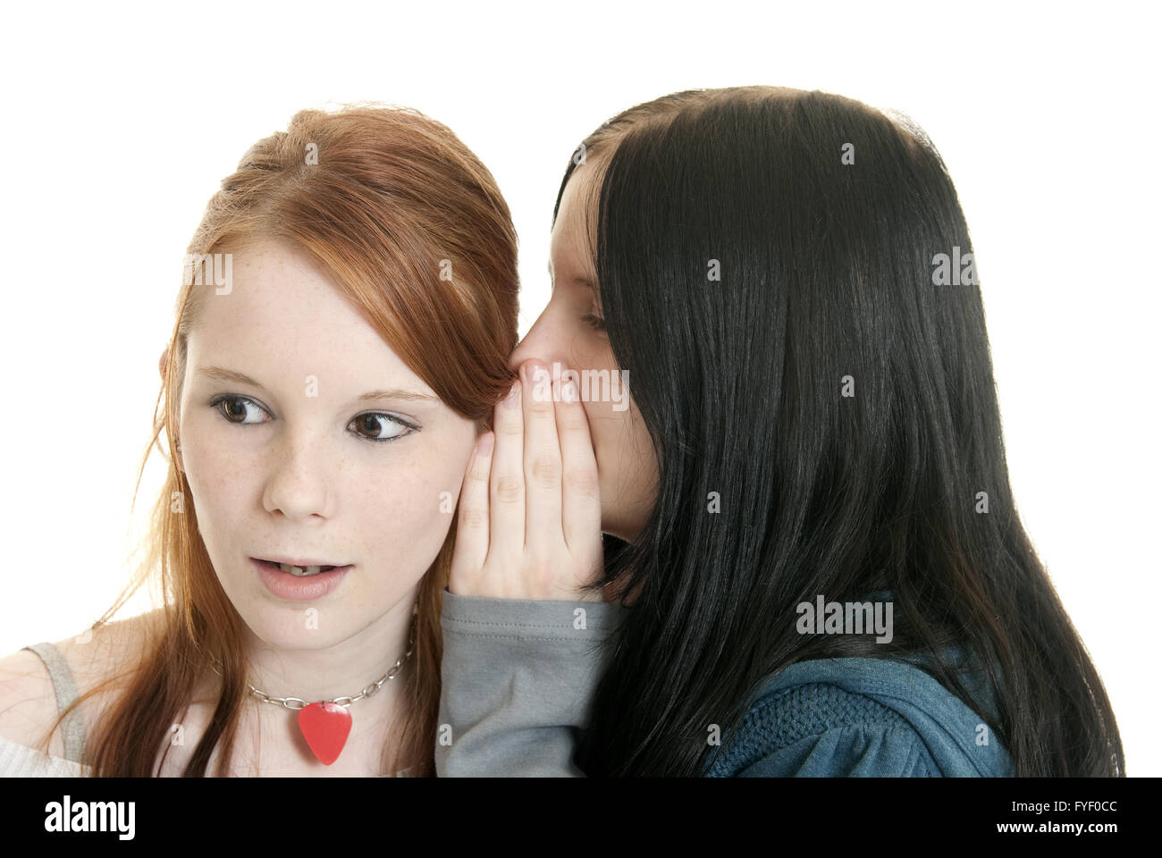 Sisters sharing secrets Stock Photo - Alamy