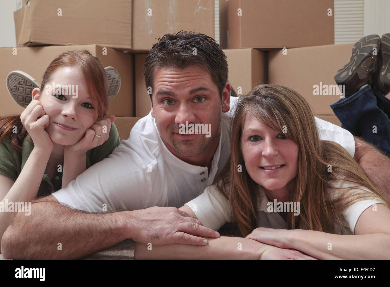 Family moving in Stock Photo - Alamy