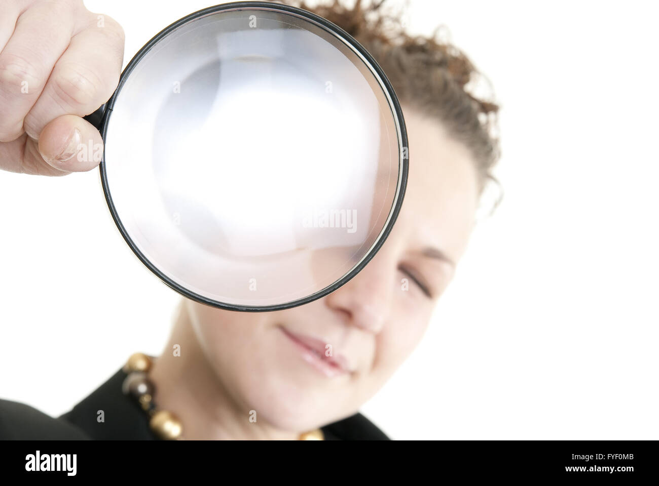 Business woman holding a magnifying glass Stock Photo - Alamy