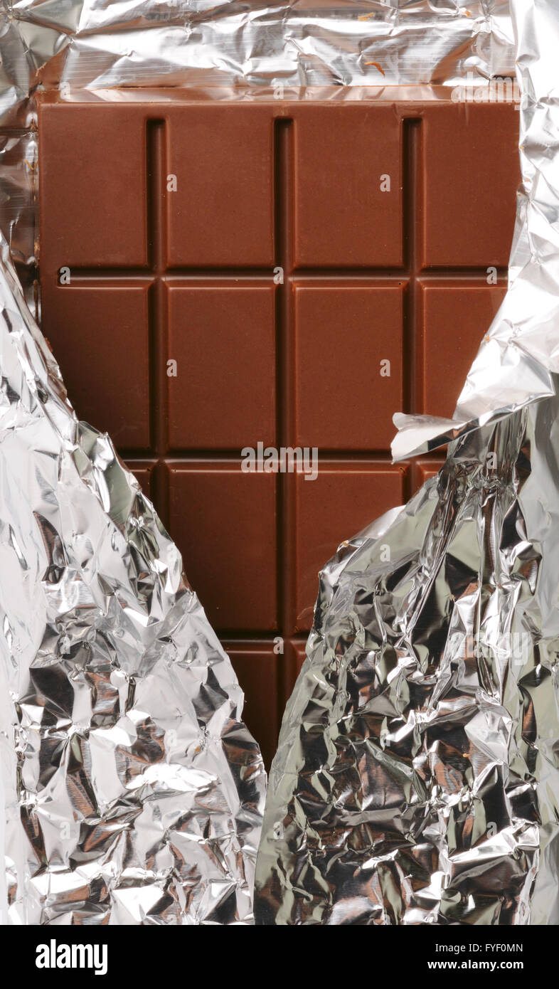 closeup of chocolate with foil wrapping Stock Photo - Alamy