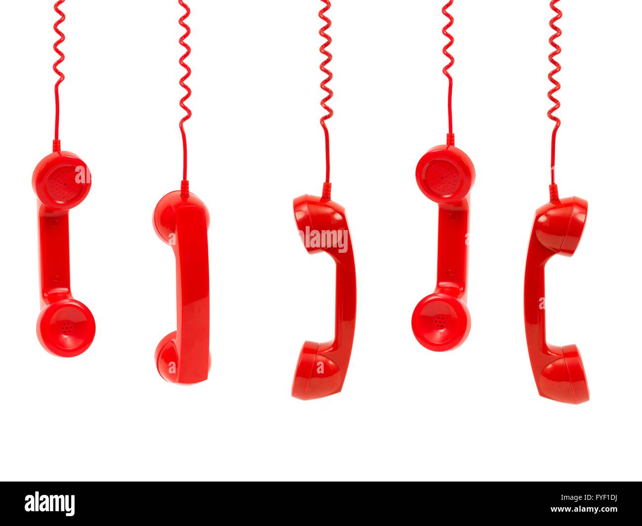 Hanging rotary telephone hand setsisolated against a white background ...