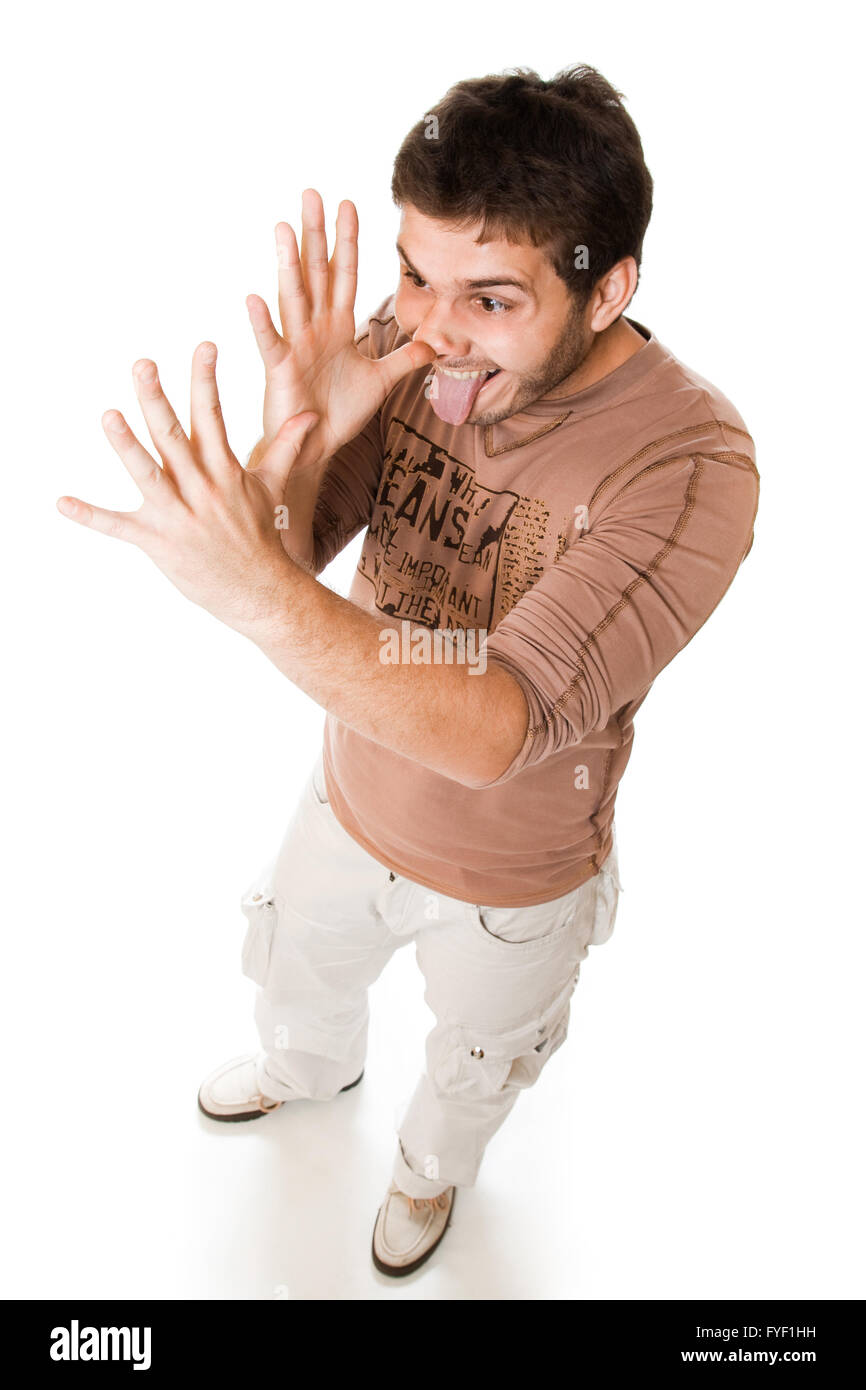 Attractive young casual guy playing the fool Stock Photo - Alamy