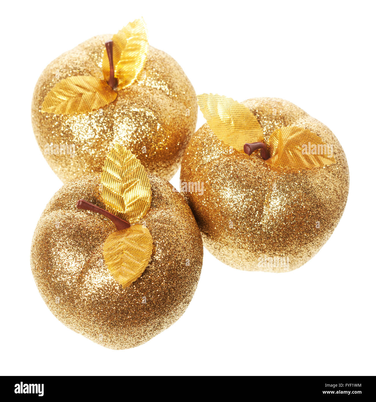 Golden apples lying on a white background Stock Photo - Alamy