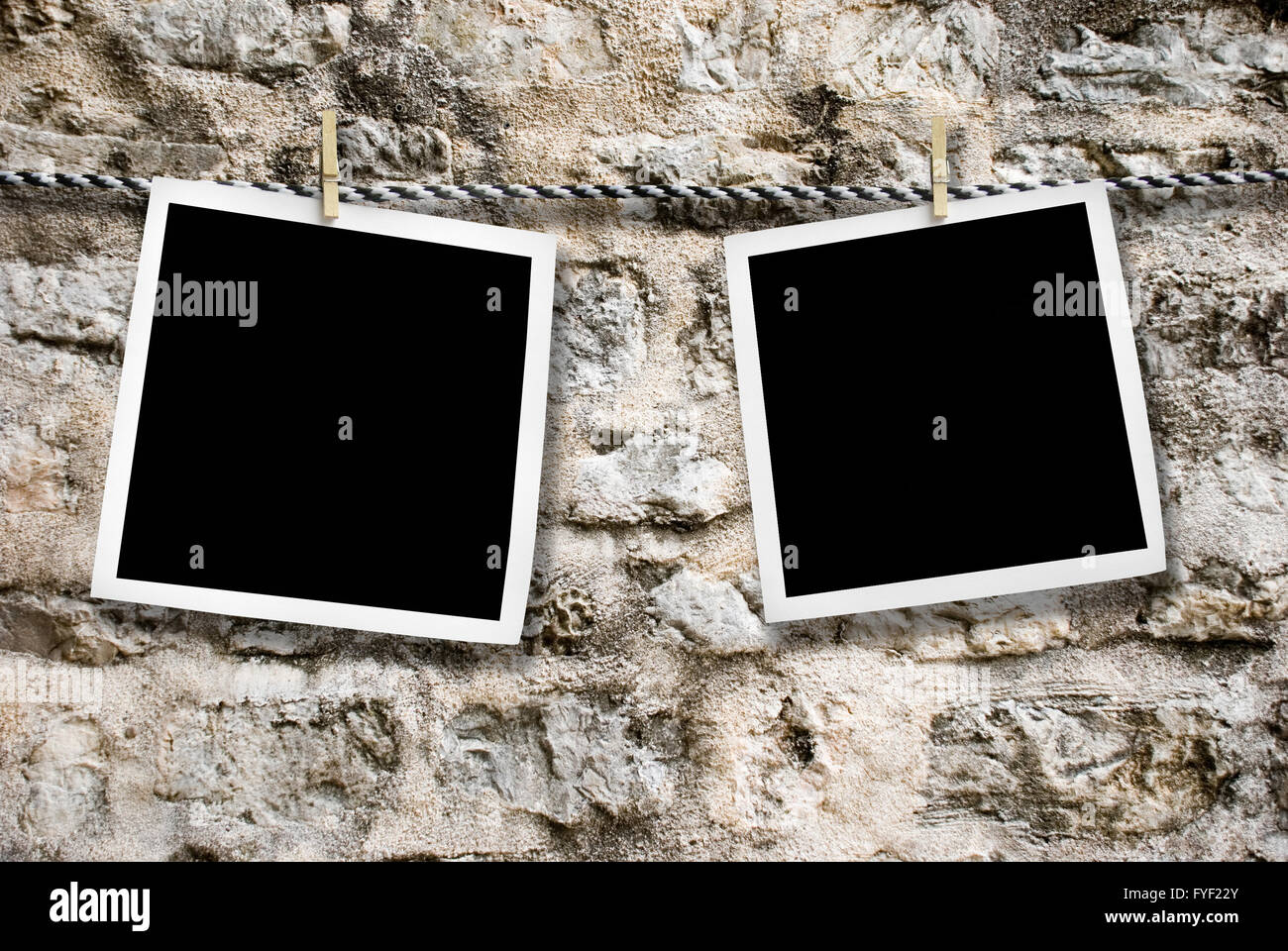 Vintage photos on a rope Stock Photo - Alamy