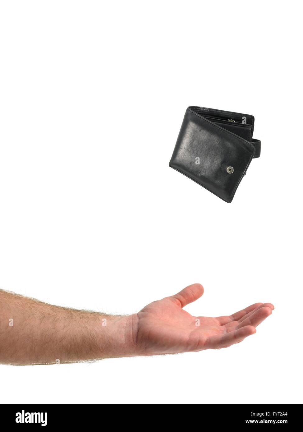 A black wallet falling isolated against a white background Stock Photo ...