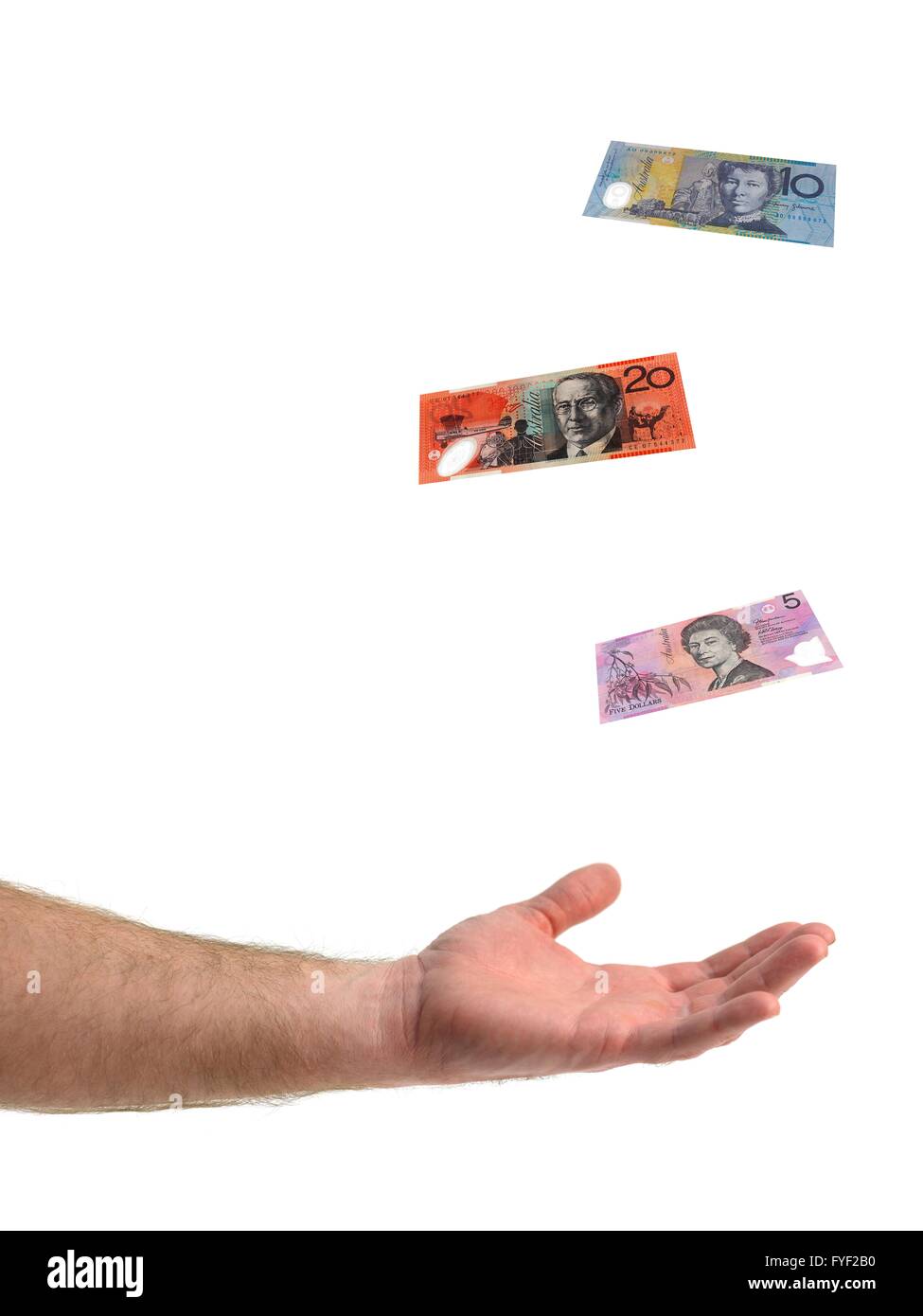 A hand catching falling notes isolated against a white background Stock ...