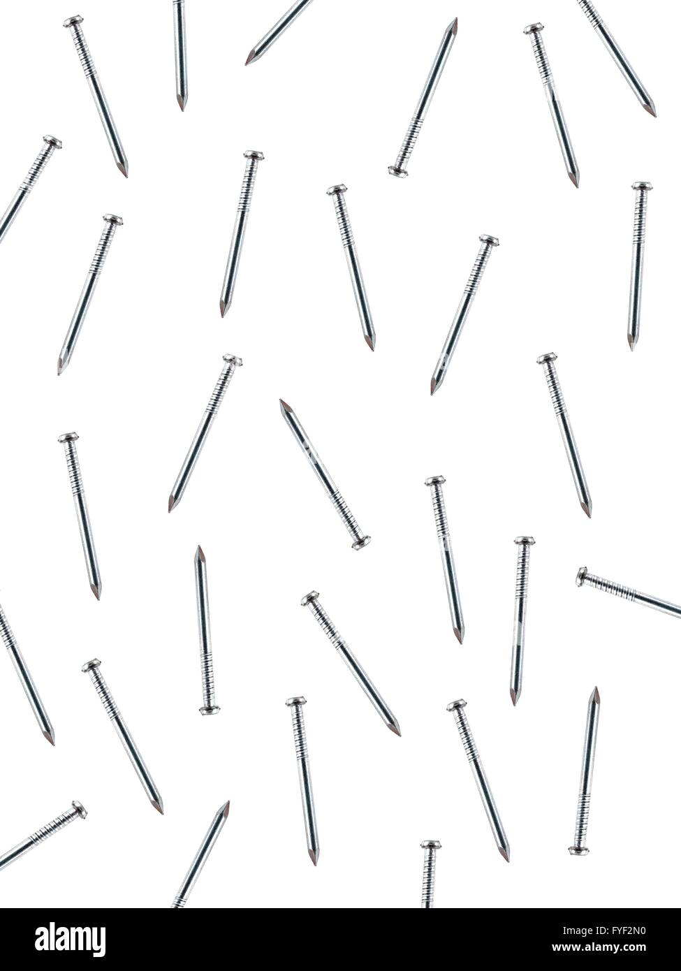Wood nails isolated against a white background Stock Photo - Alamy
