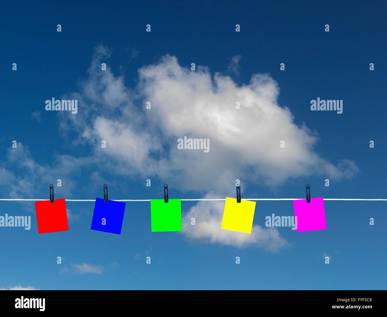 Post it notes on a clothes line isolated against a blue sky Stock Photo ...