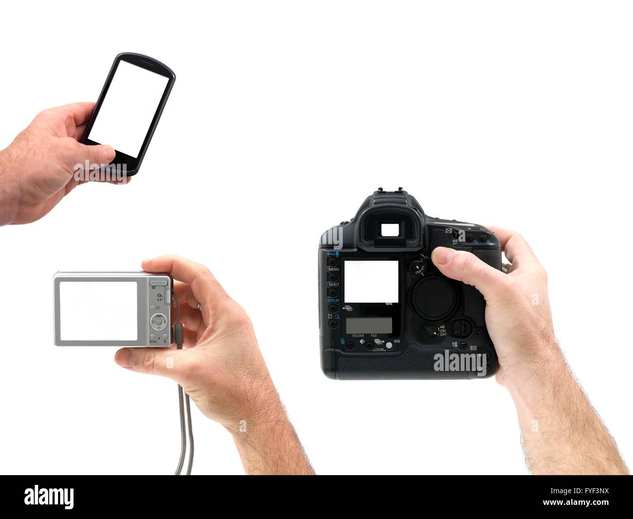 Digital cameras hand held isolated against a white background Stock ...