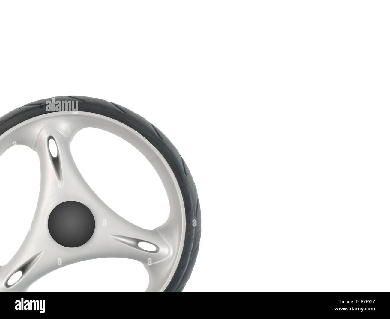 A plastic wheel isolated against a white background Stock Photo - Alamy
