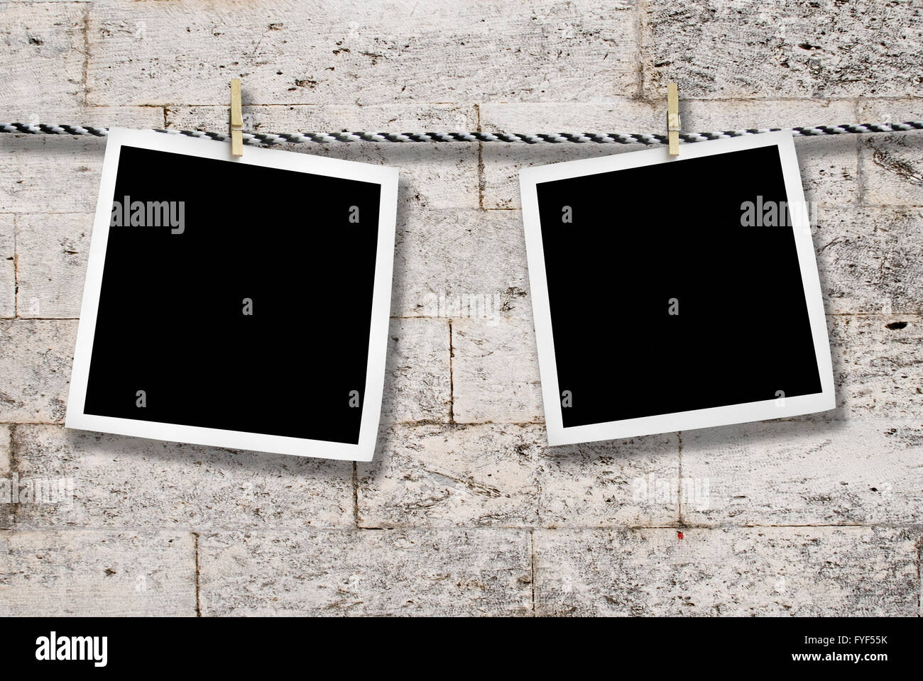Vintage photos on a rope Stock Photo - Alamy