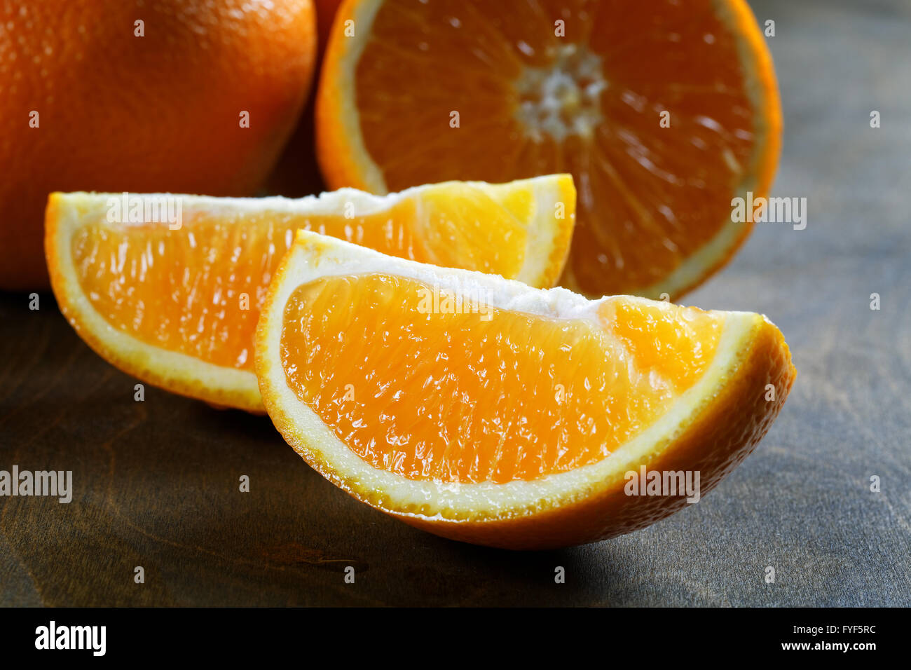 Orange slice close-up on the table Stock Photo - Alamy