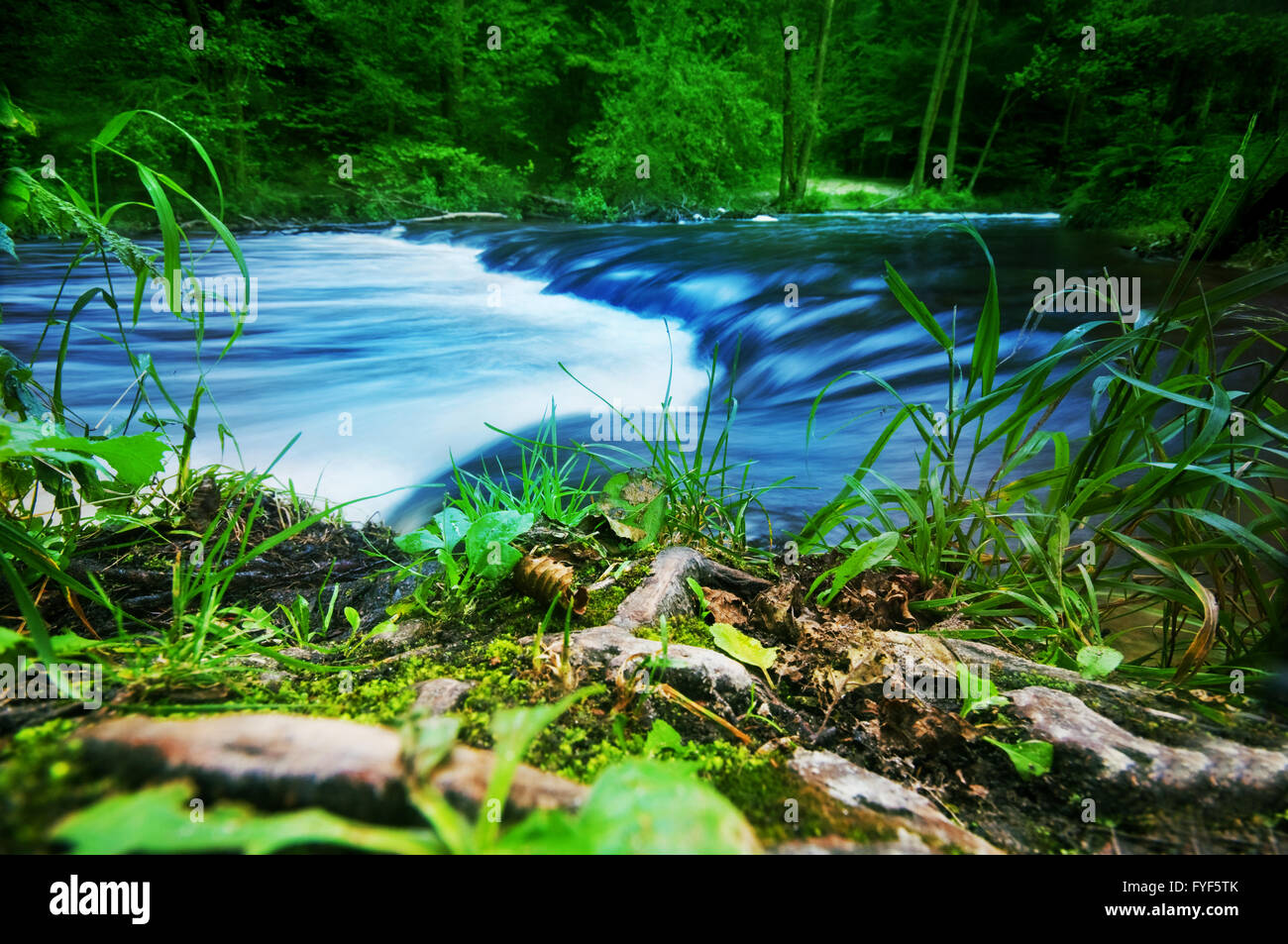 Mountain water stream running in hi-res stock photography and images ...