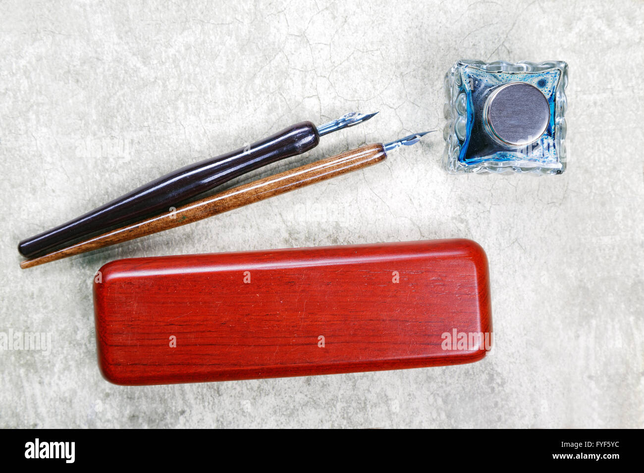 vintage fountain pens and ink on a retro background Stock Photo - Alamy