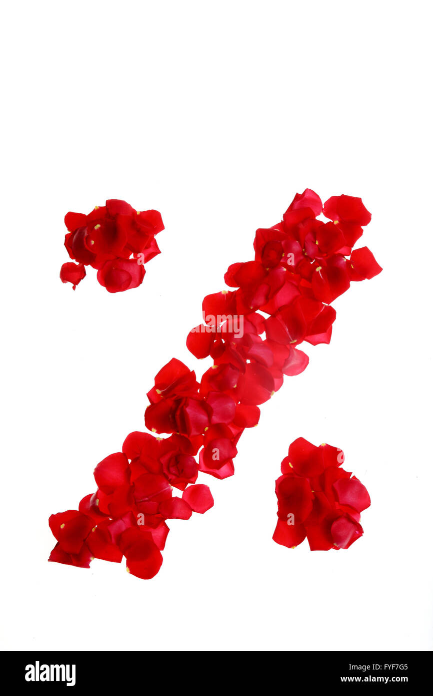Red rose petals forming symbols Stock Photo - Alamy