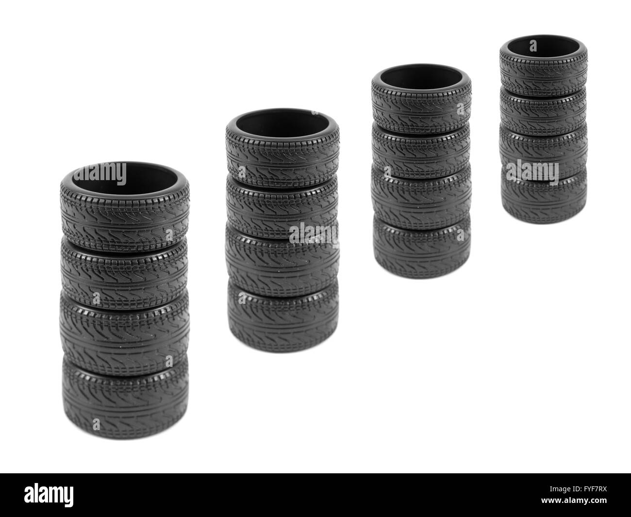 Rubber tyres with sports rims on a white background Stock Photo - Alamy