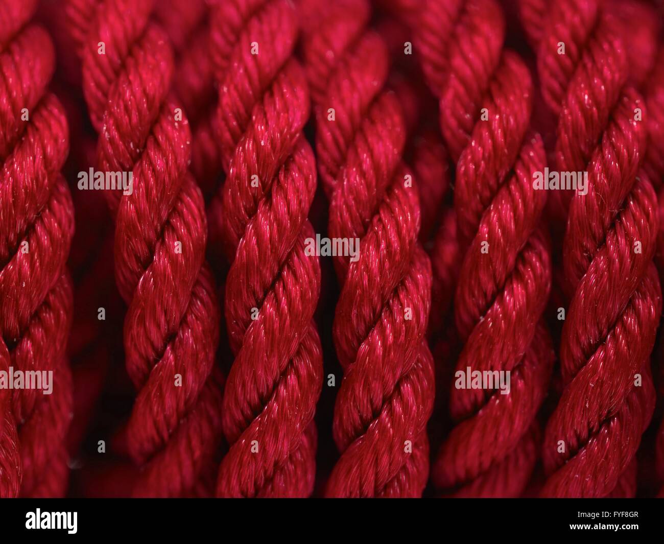 Pieces of rope isolated against a white background Stock Photo - Alamy