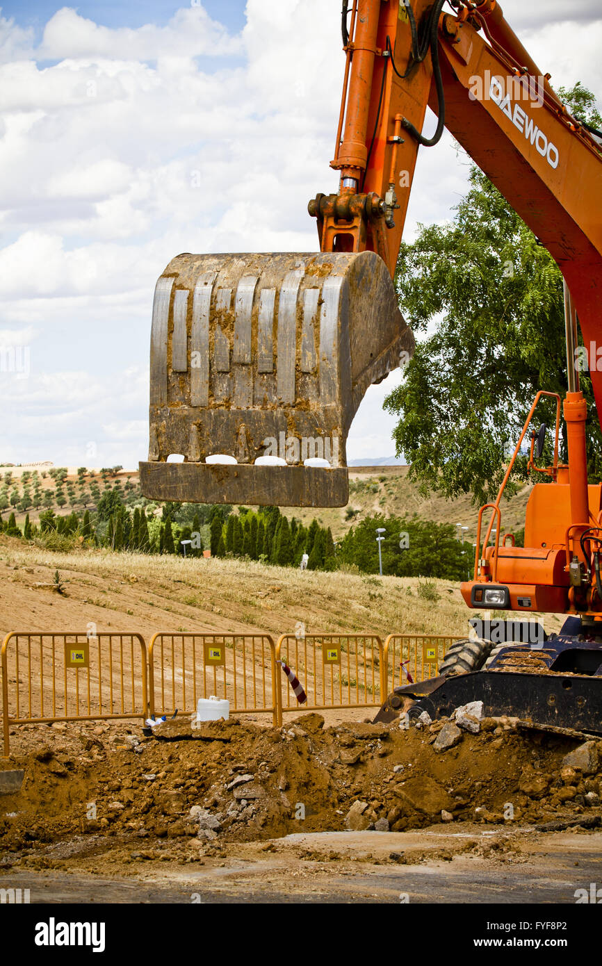 Closeup skid steer loader excavator at road construction work Stock ...