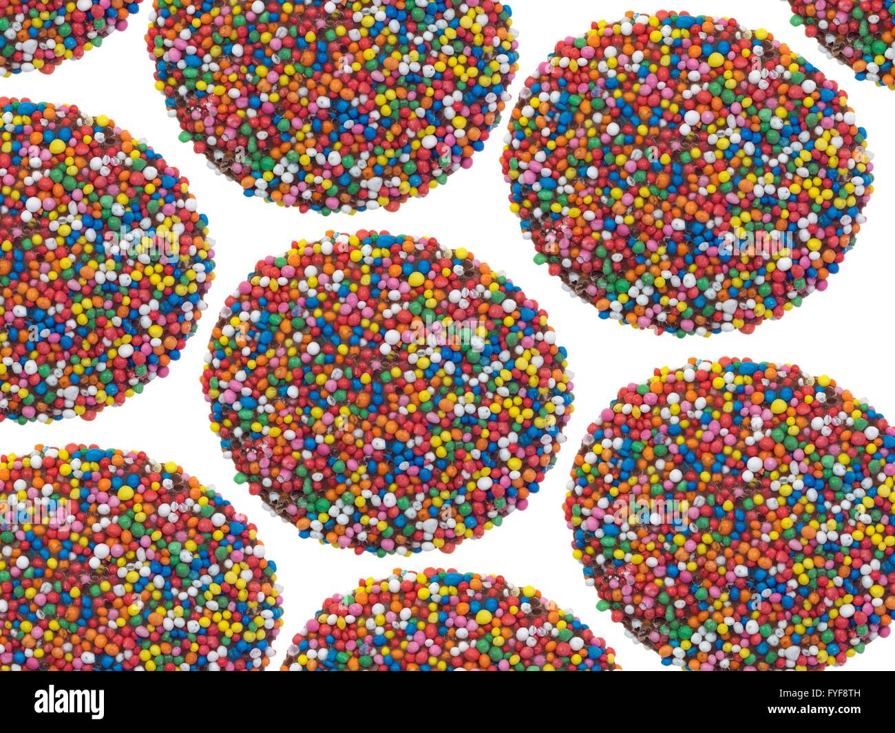 Chocolate freckles isolated against a white background Stock Photo - Alamy