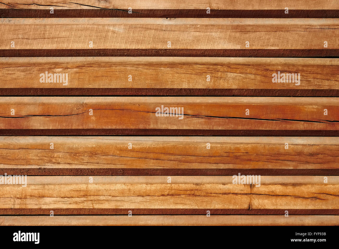 Old parallel wooden logs Stock Photo - Alamy