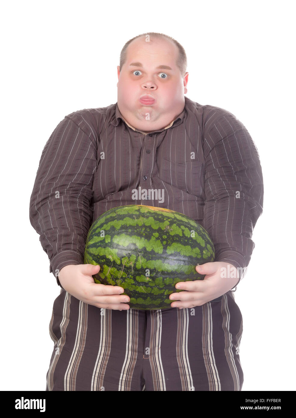 Fat man struggling to hold the weight of a whole watermelon Stock Photo ...