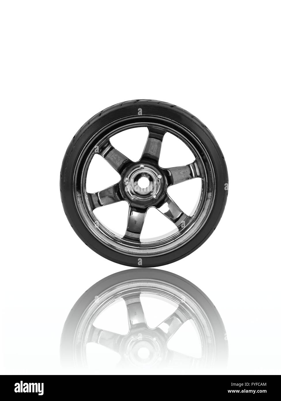 Rubber tyres with sports rims on a white background Stock Photo - Alamy