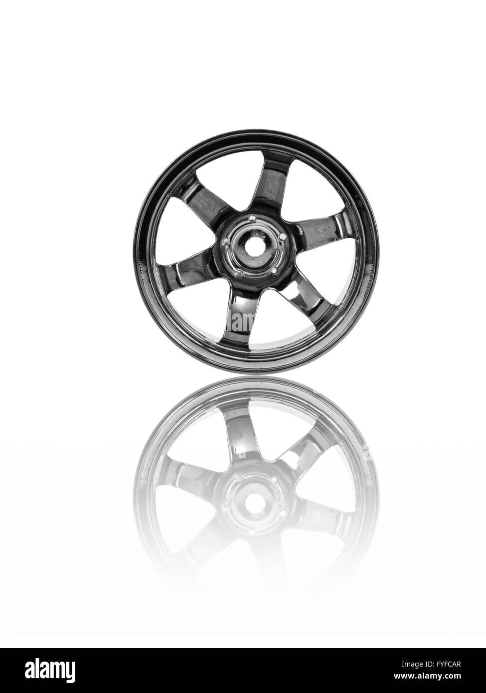 Rubber tyres with sports rims on a white background Stock Photo - Alamy