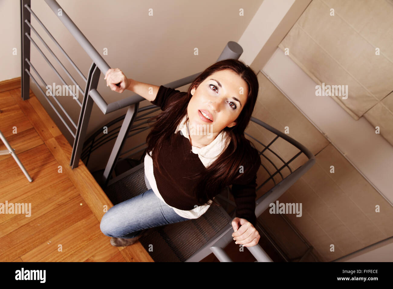 Teen girl walking up stairs hi-res stock photography and images - Alamy