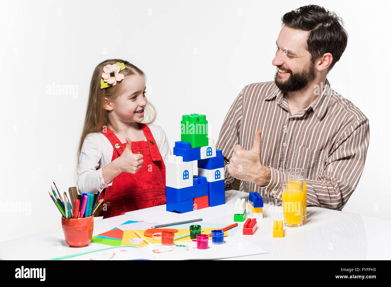 Father and daughter playing educational games together Stock Photo - Alamy