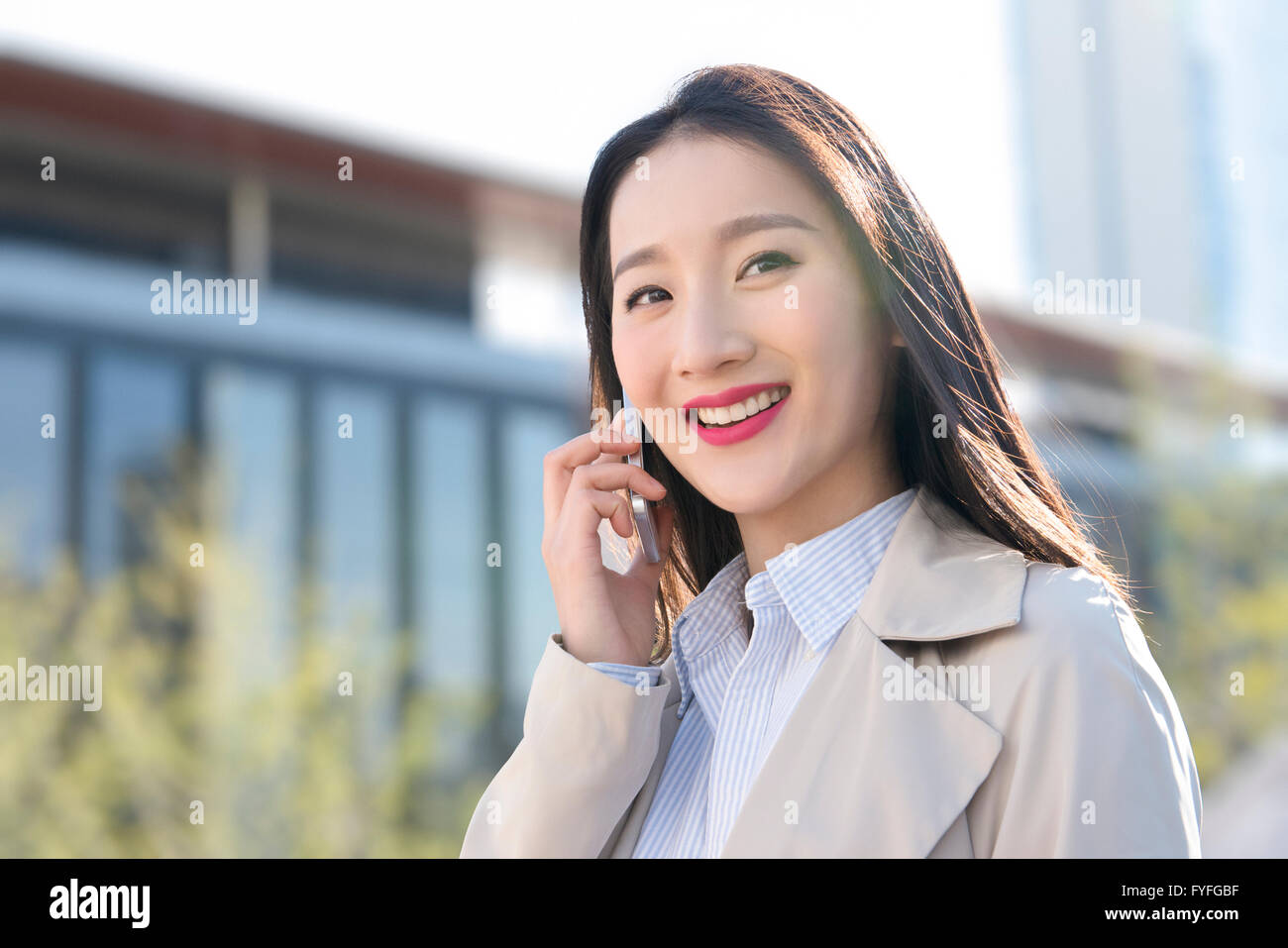 Businesswoman using smart phone Stock Photo - Alamy