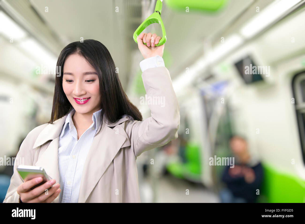 People in subway train with phone hi-res stock photography and images ...