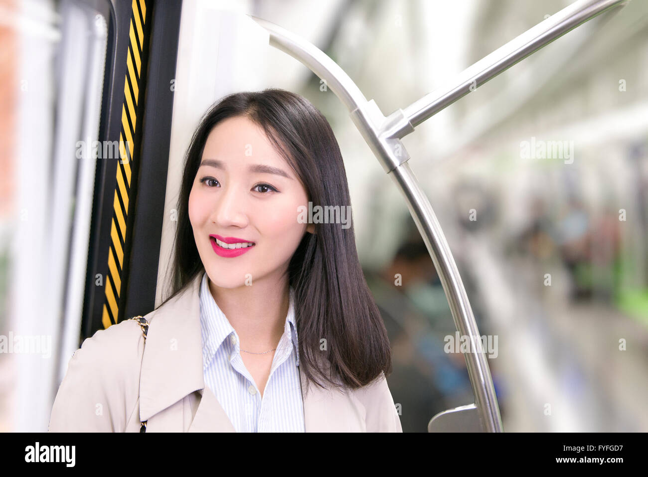 Women in subway hi-res stock photography and images - Alamy