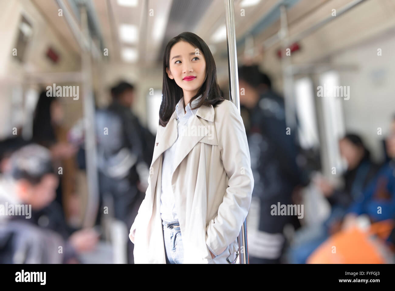 Women in subway hi-res stock photography and images - Alamy