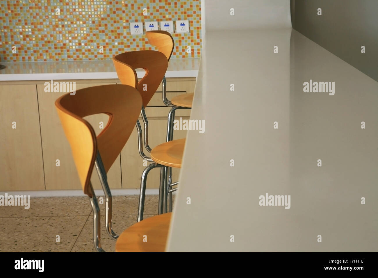 Chair beside the table Stock Photo - Alamy