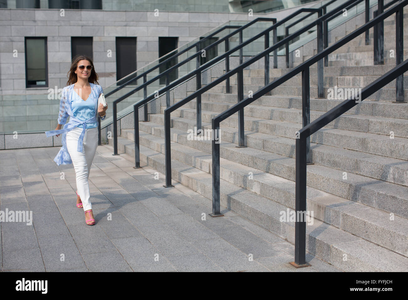 Office worker walking building hi-res stock photography and images - Alamy