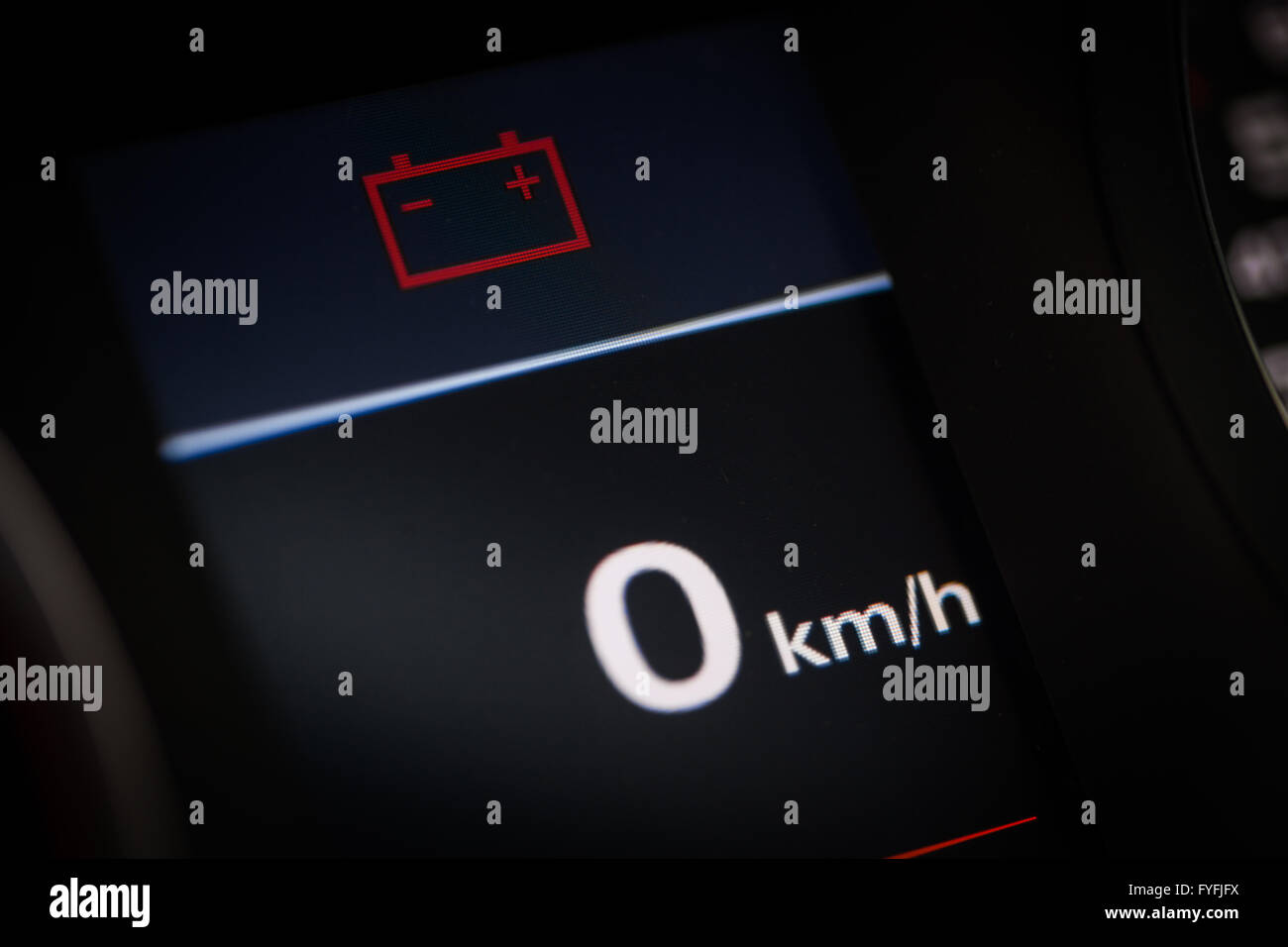 Color detail of the battery warning symbol in a car Stock Photo - Alamy