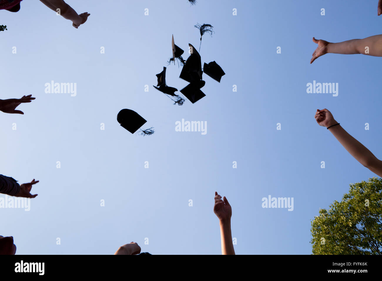 high school graduation hats high Stock Photo - Alamy
