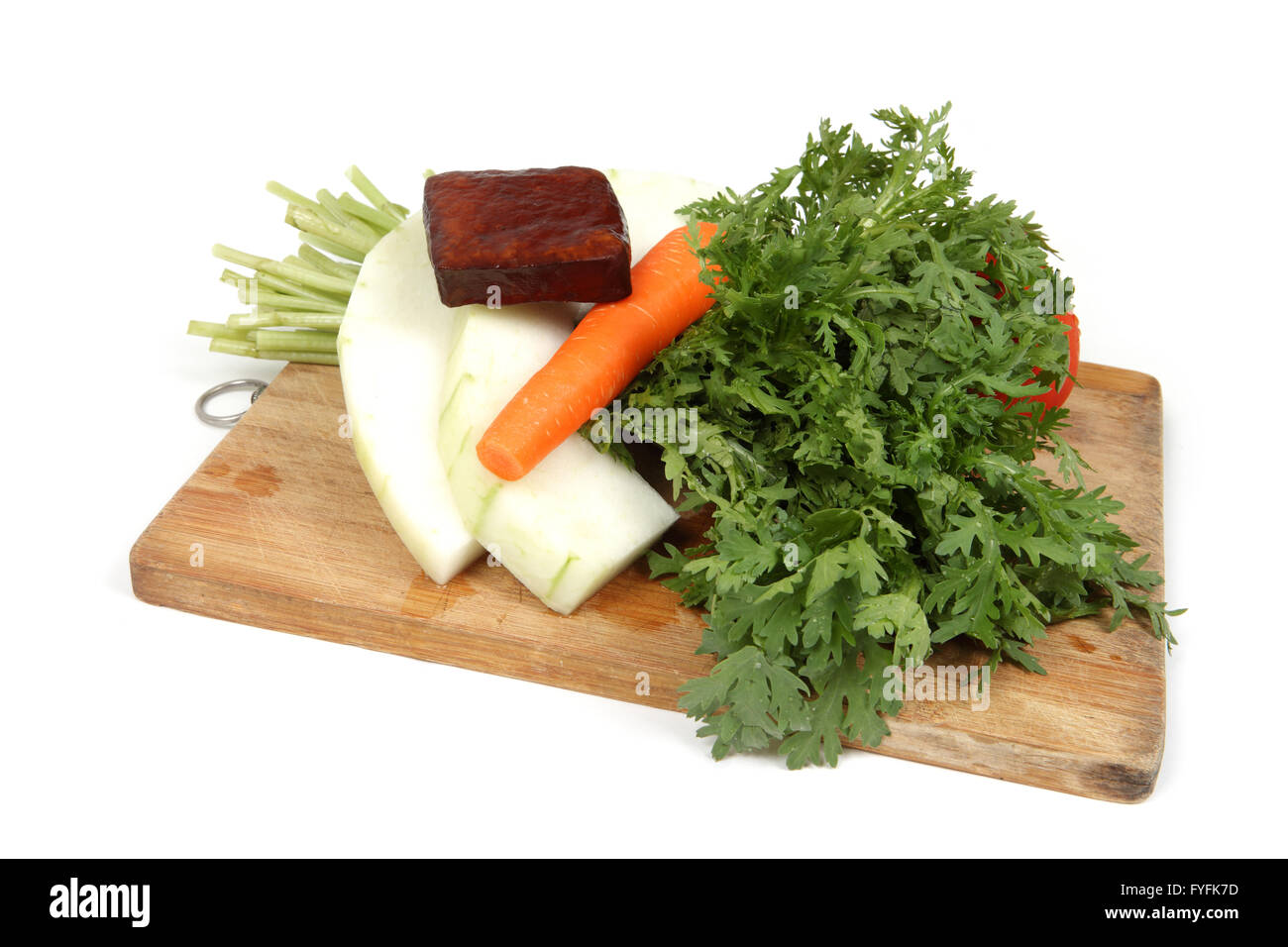 vegetables on chopping block Stock Photo - Alamy