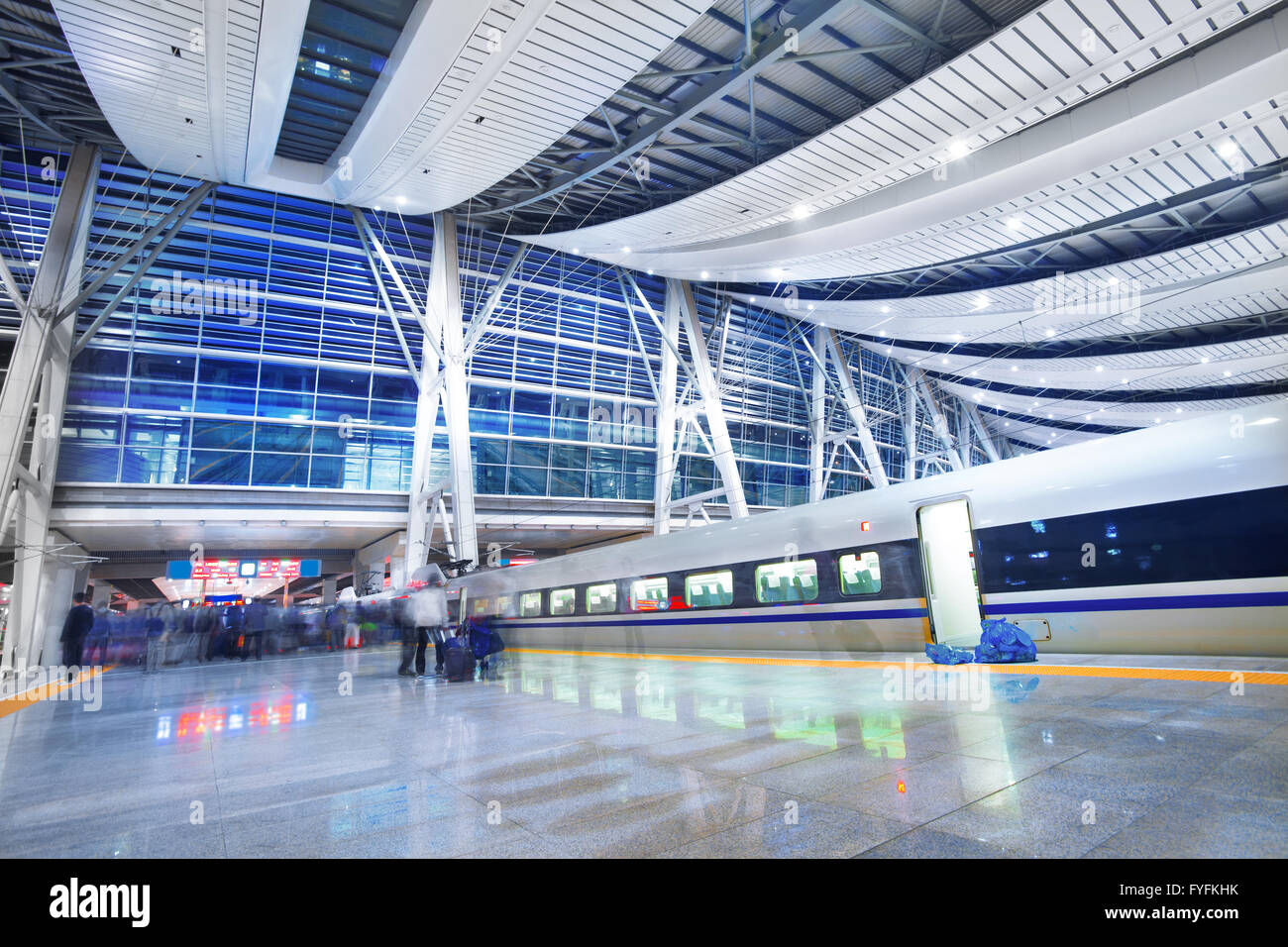train stop at railway station with sunset Stock Photo - Alamy