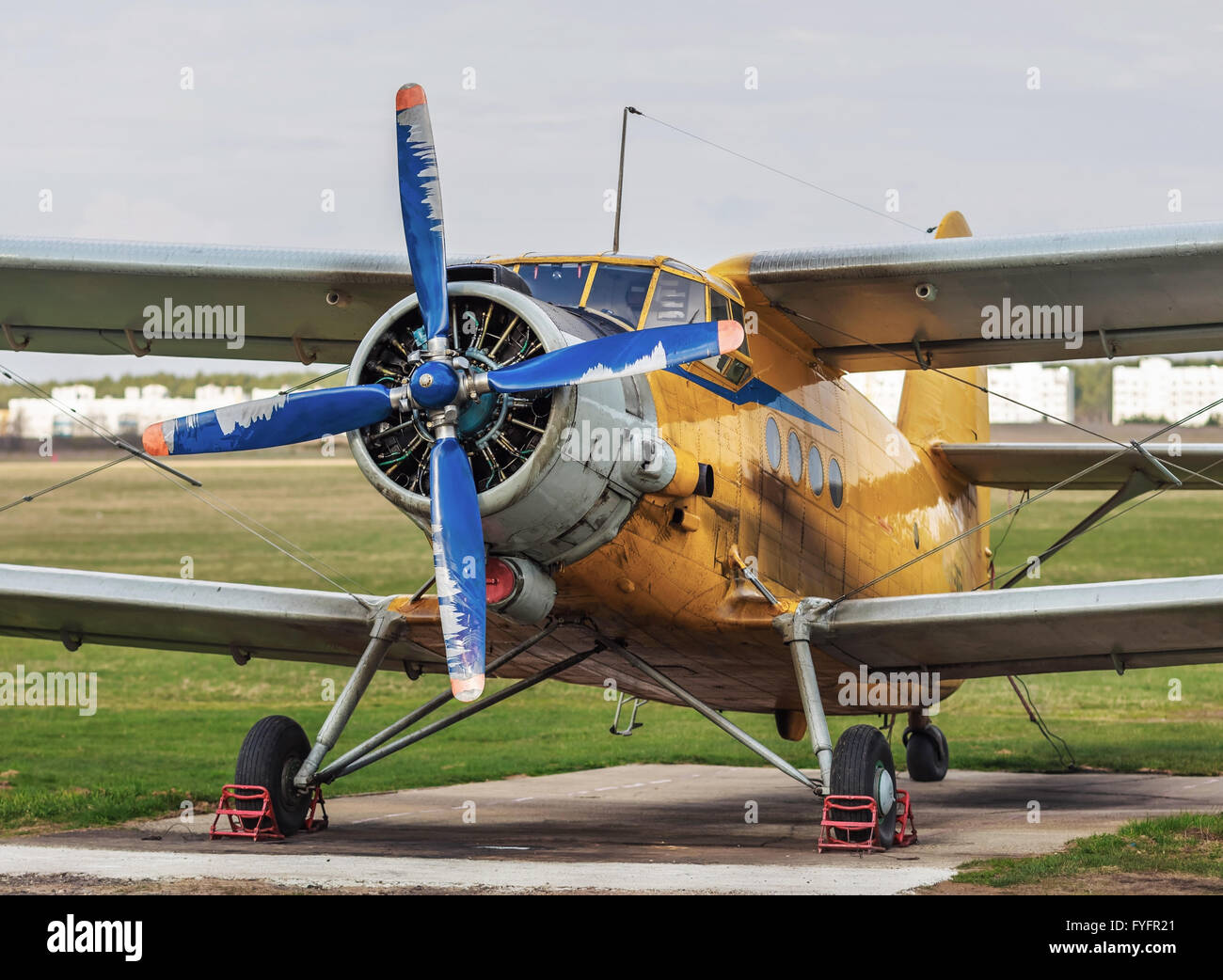 Airplane with blue propeller. Old vintage single-engined plane. Retro ... Airplane with blue propeller. Old vintage single-engined plane. Retro ...