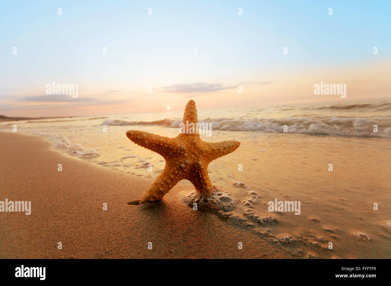 Wave on beach sunset time hi-res stock photography and images - Alamy