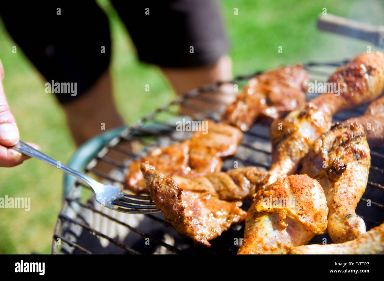 Cooking on the barbecue grill Stock Photo - Alamy