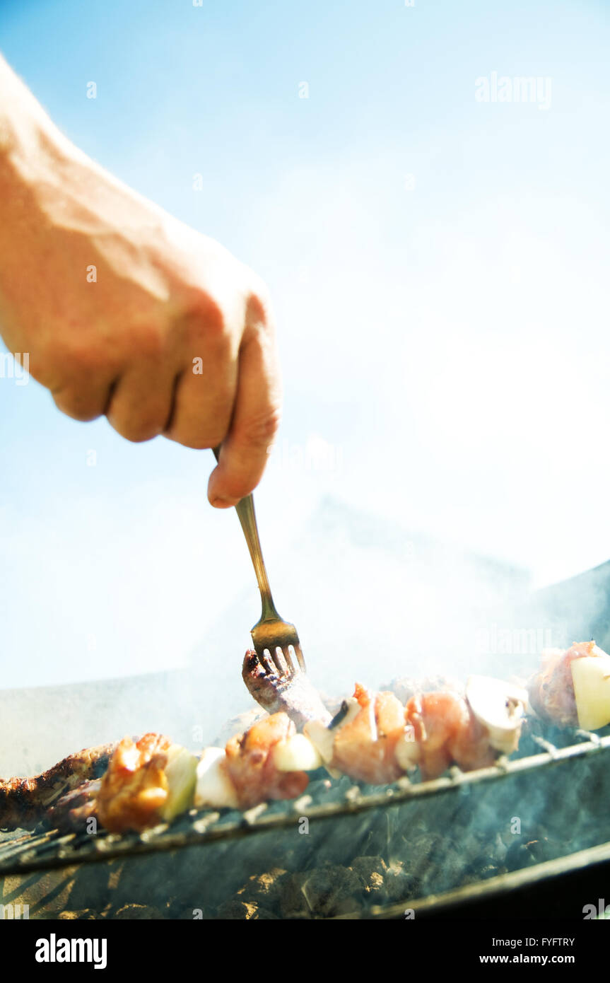 Cooking on the barbecue grill Stock Photo - Alamy