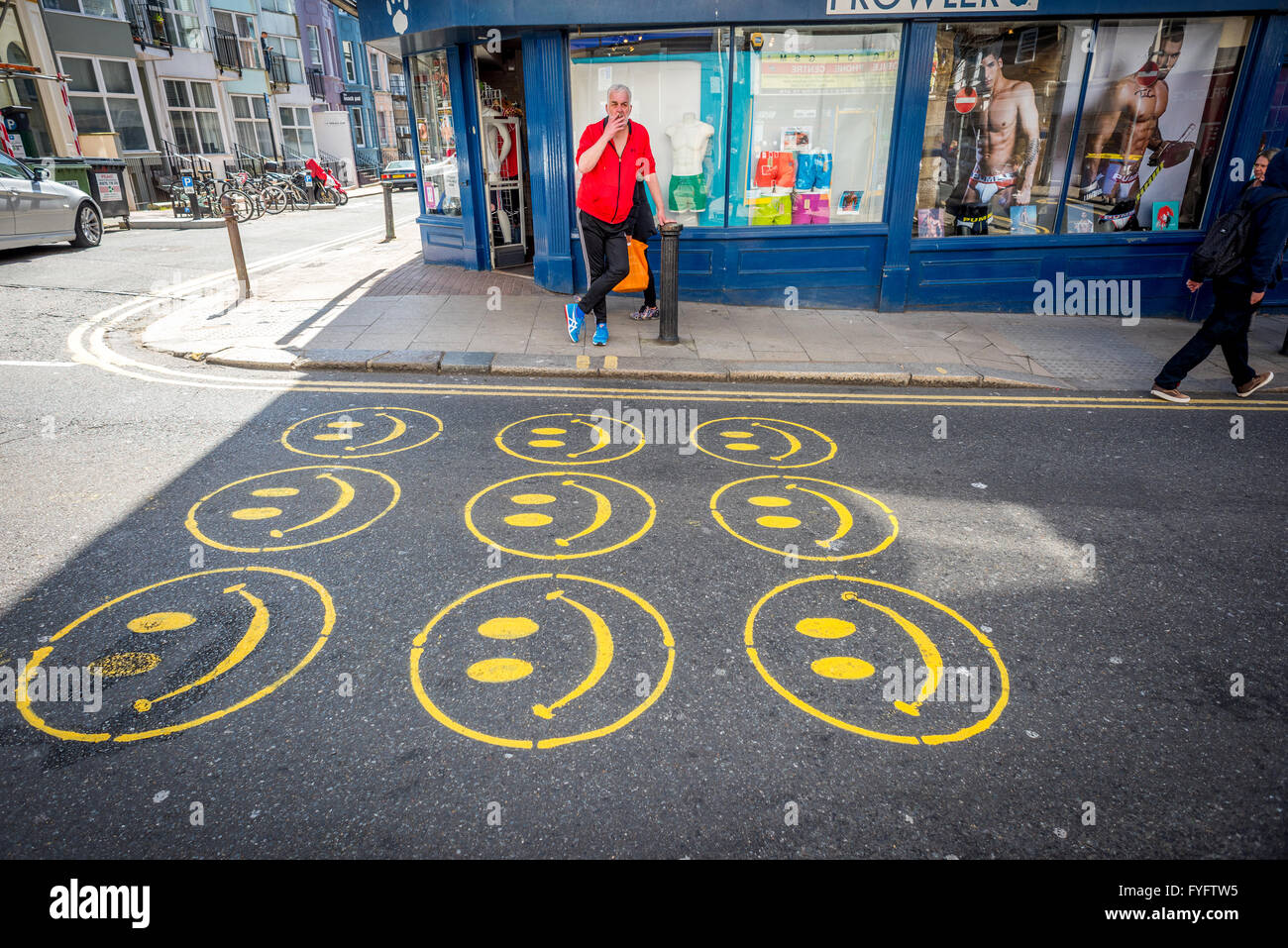 Smiley faces painted onto the road in Brighton Stock Photo - Alamy
