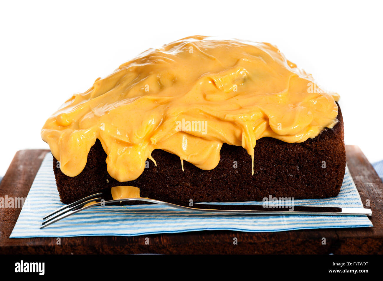 Cake with yellow icing Stock Photo - Alamy