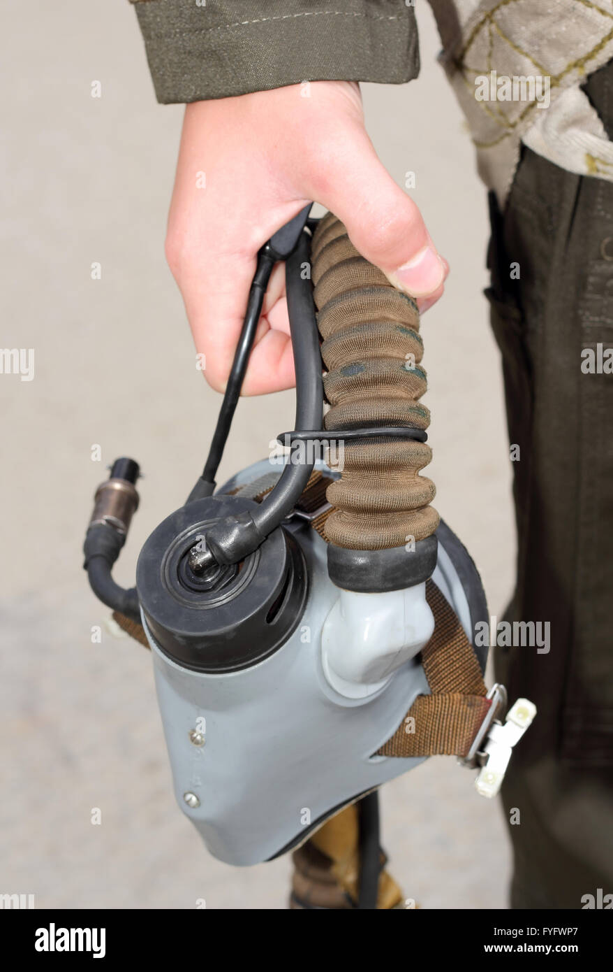 Oxygen mask in his hand a military pilot hi-res stock photography and ...