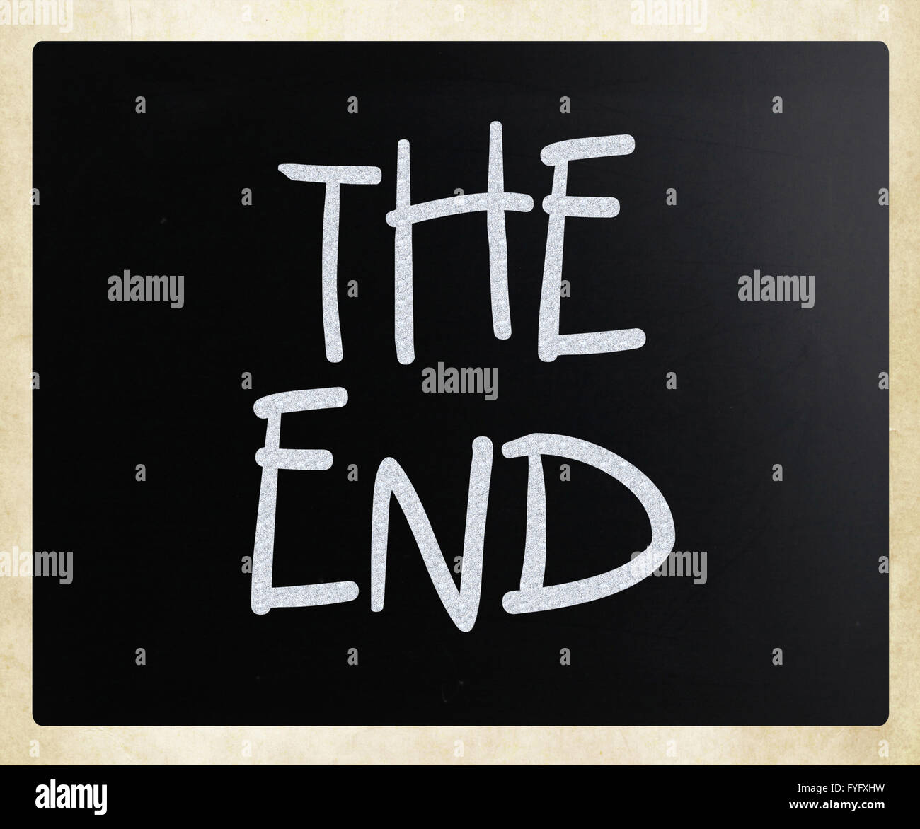 The End handwritten with white chalk on a blackboard Stock Photo - Alamy