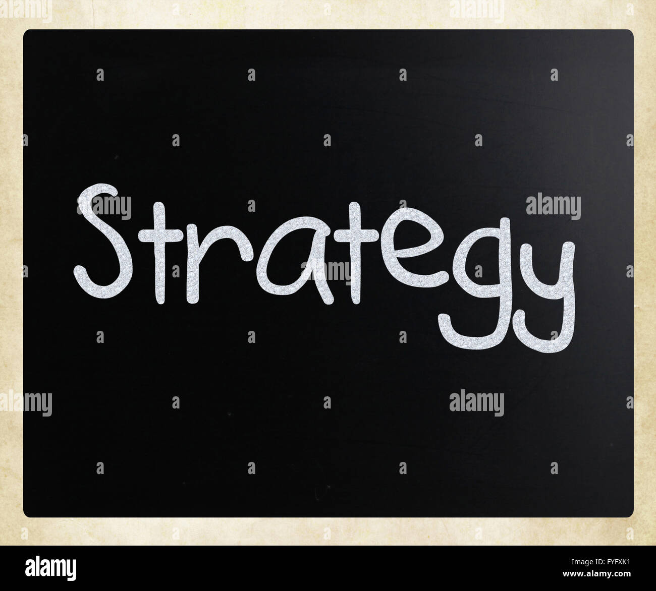 Strategy handwritten with white chalk on a blackboard Stock Photo - Alamy