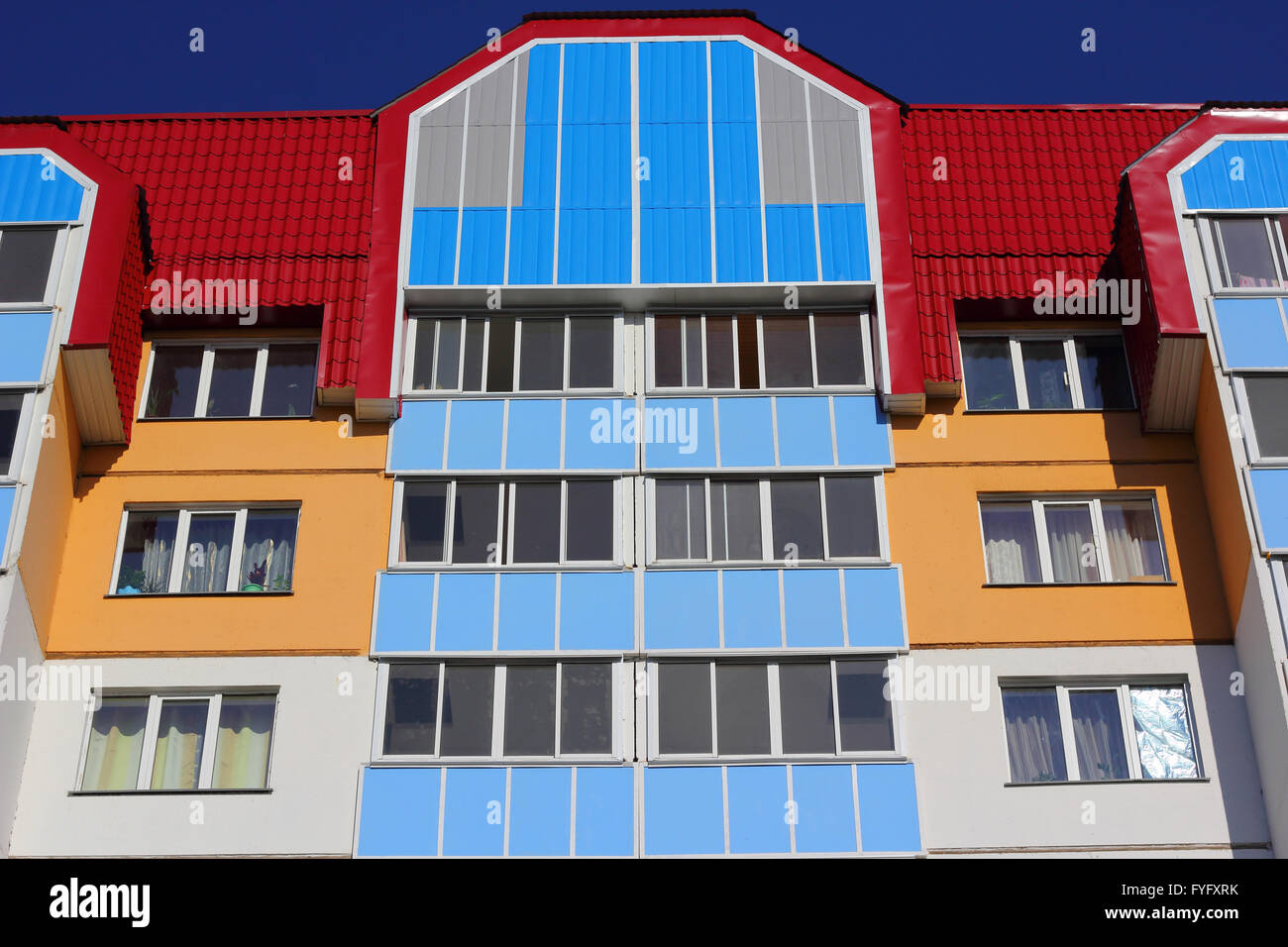 The inhabited high house against the blue sky Stock Photo - Alamy